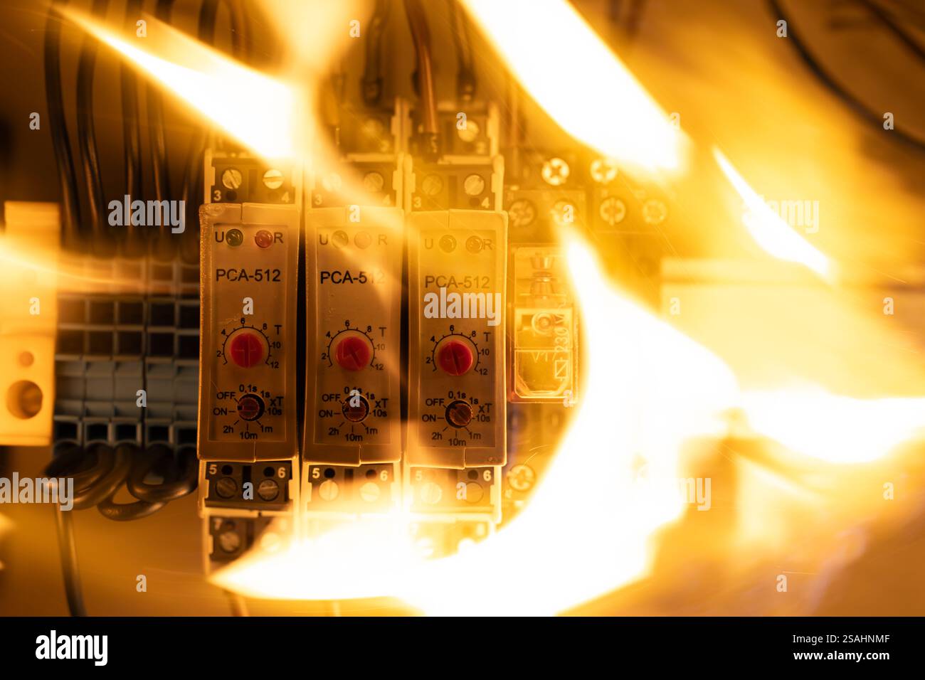 Electrical Components with Flame Effect Stock Photo - Alamy