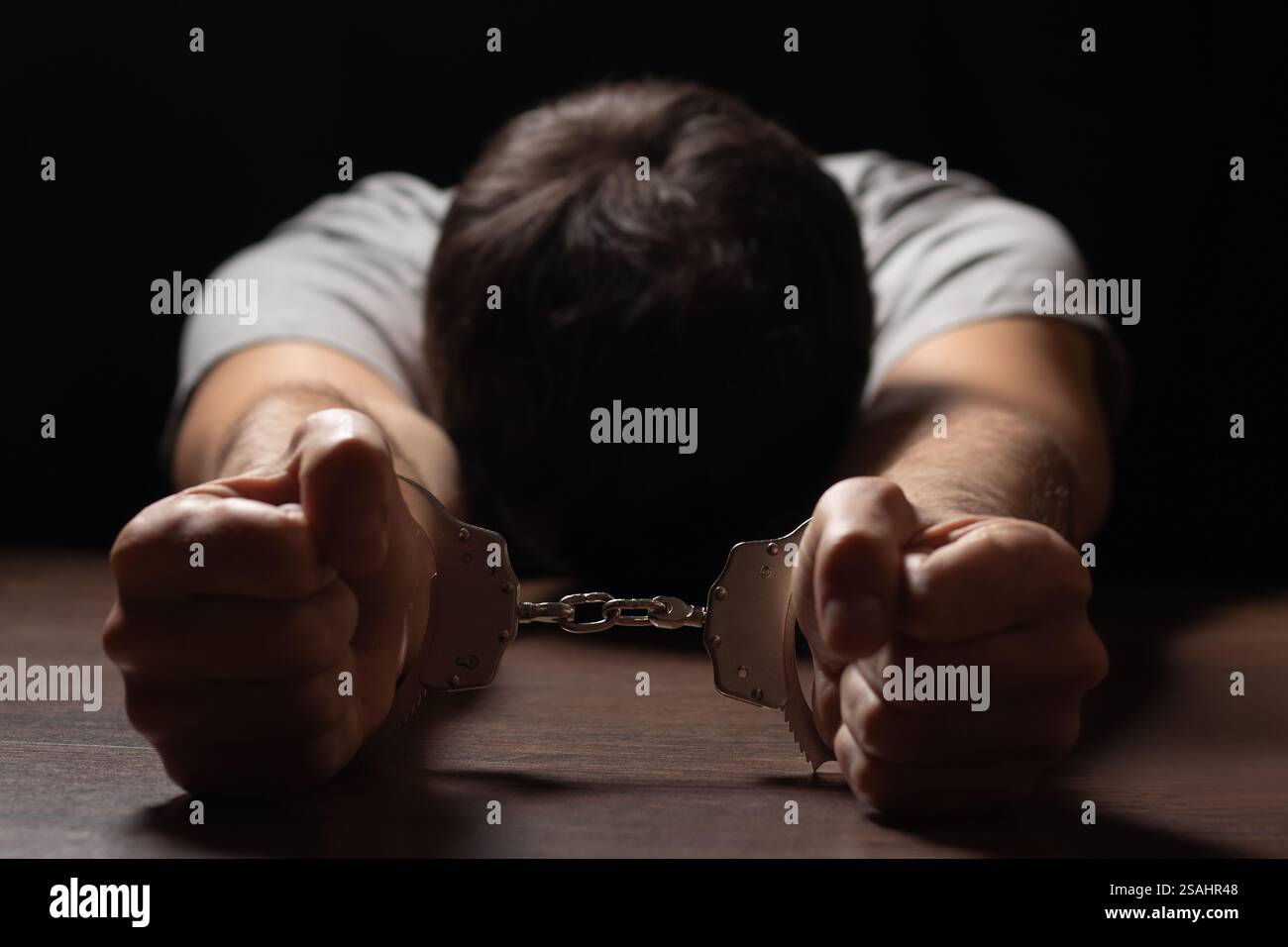 Man, criminal and handcuffs for interrogation, crime or money ...