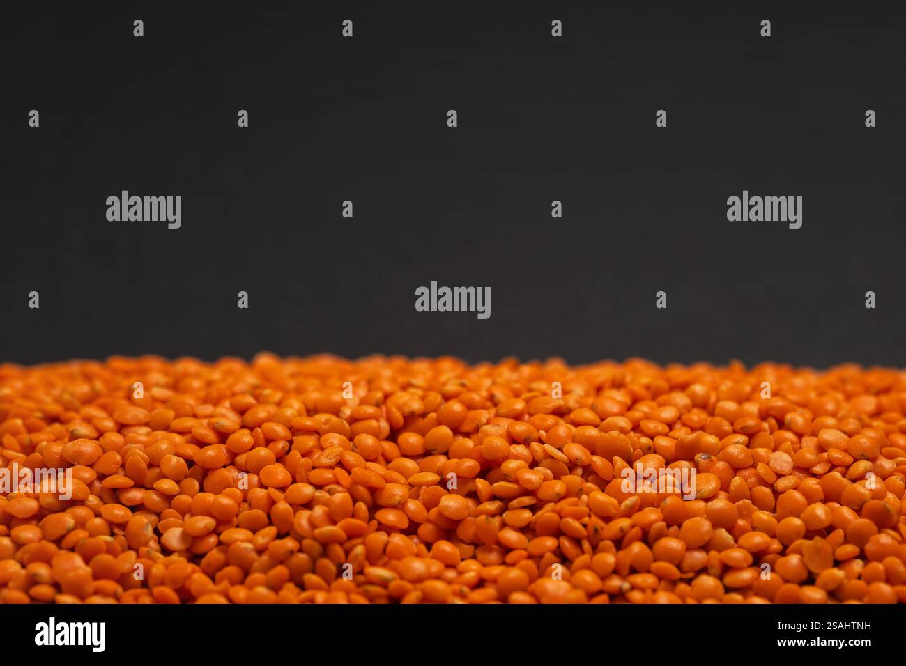 Red lentils pile. Dry orange lentil grains, heap of dal, dhal, masoor ...