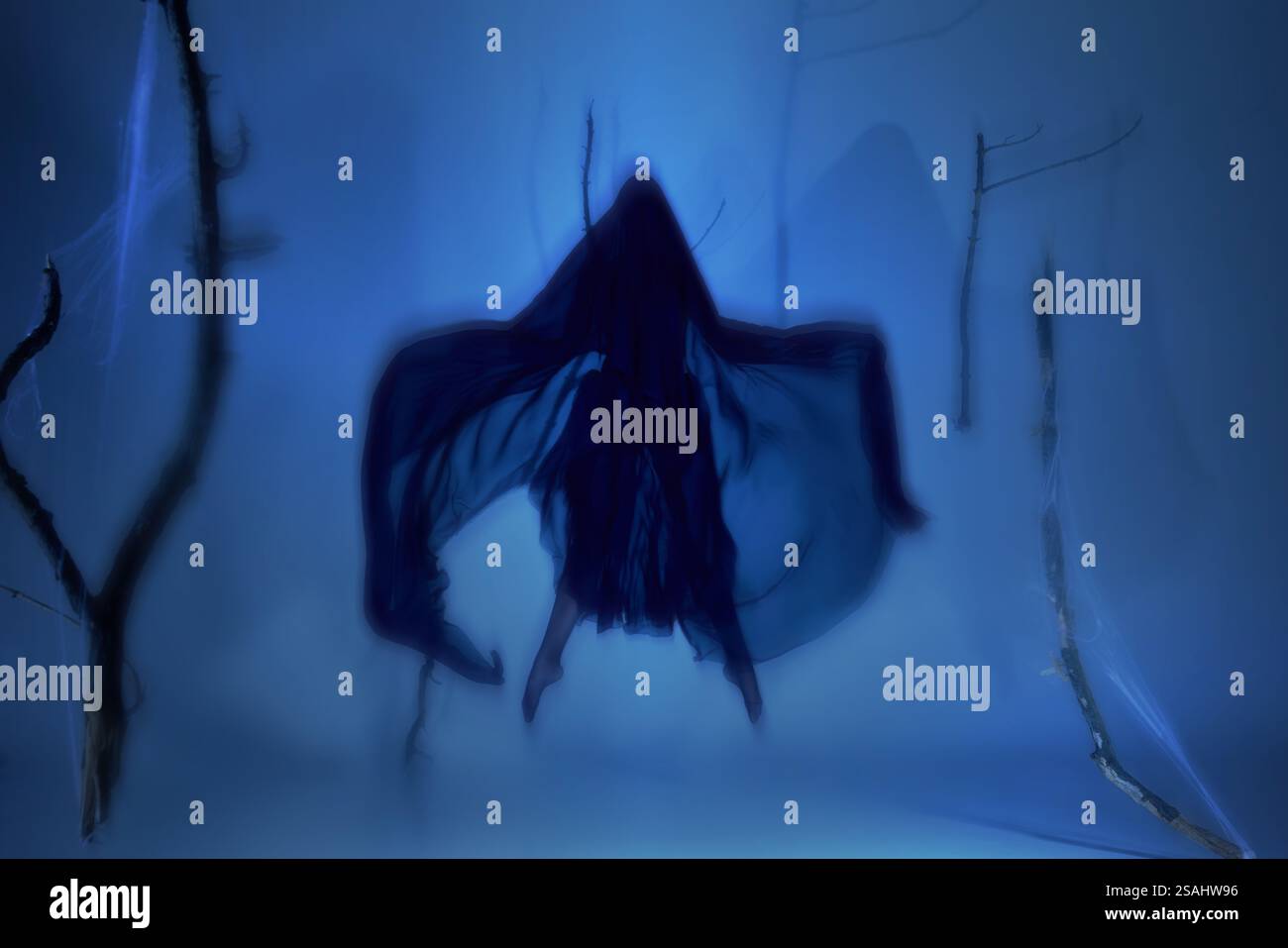 Floating through mist, ghost like ballerina dancing in eerie ballet ...