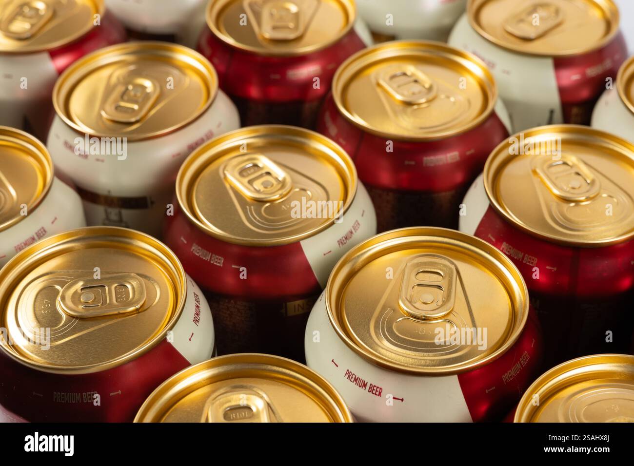 gold beer cans close up background Stock Photo - Alamy
