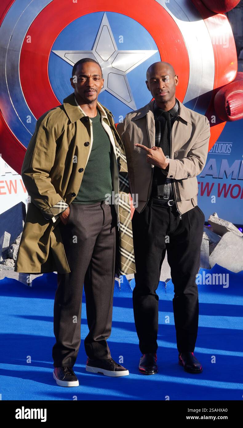 Anthony Mackie (left) and Julius Onah attend a photo call for Captain America: Brave New World ...