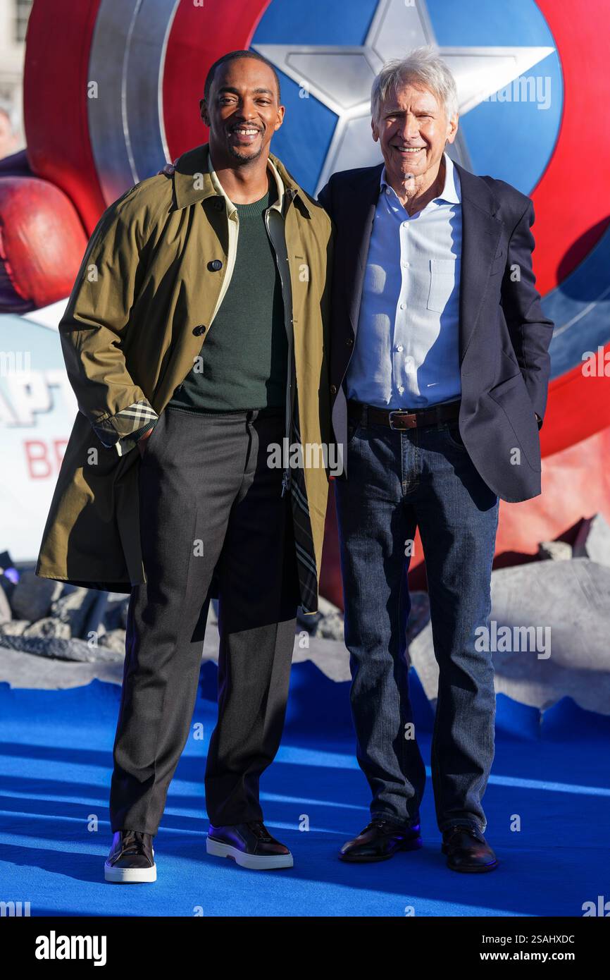 Anthony Mackie, left, and Harrison Ford pose for photographers at the ...