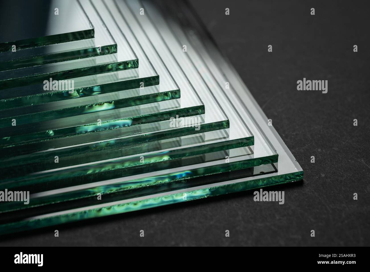 Glass factories produce glass used in buildings and homes. There are ...