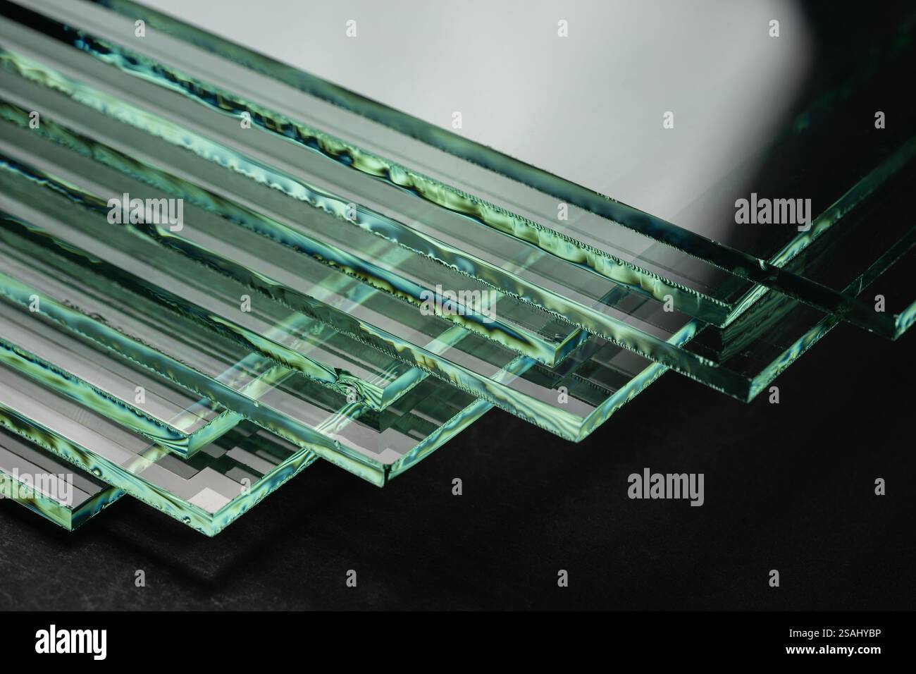 Glass factories produce glass used in buildings and homes. There are ...