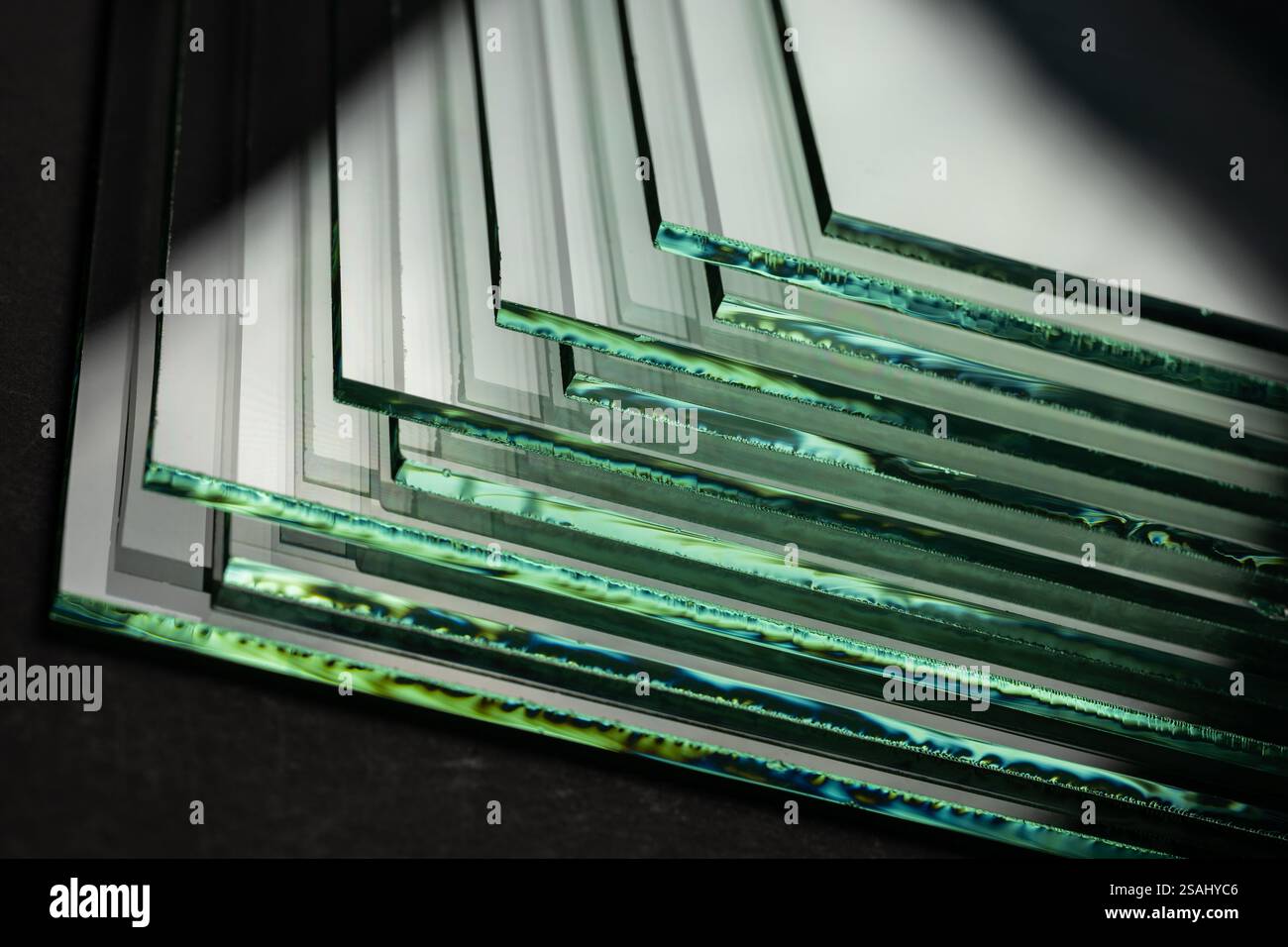 Glass factories produce glass used in buildings and homes. There are ...