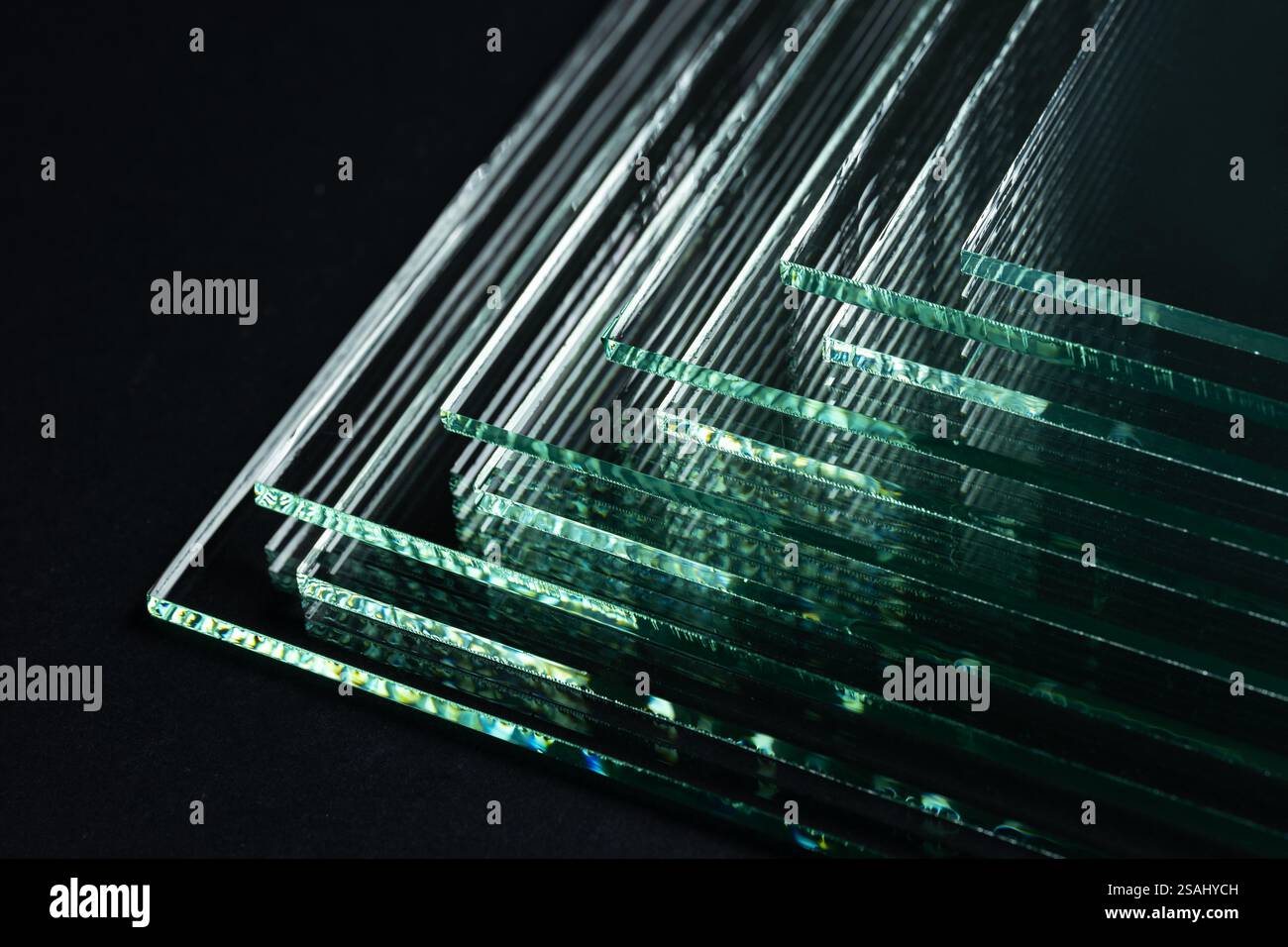 Glass factories produce glass used in buildings and homes. There are ...