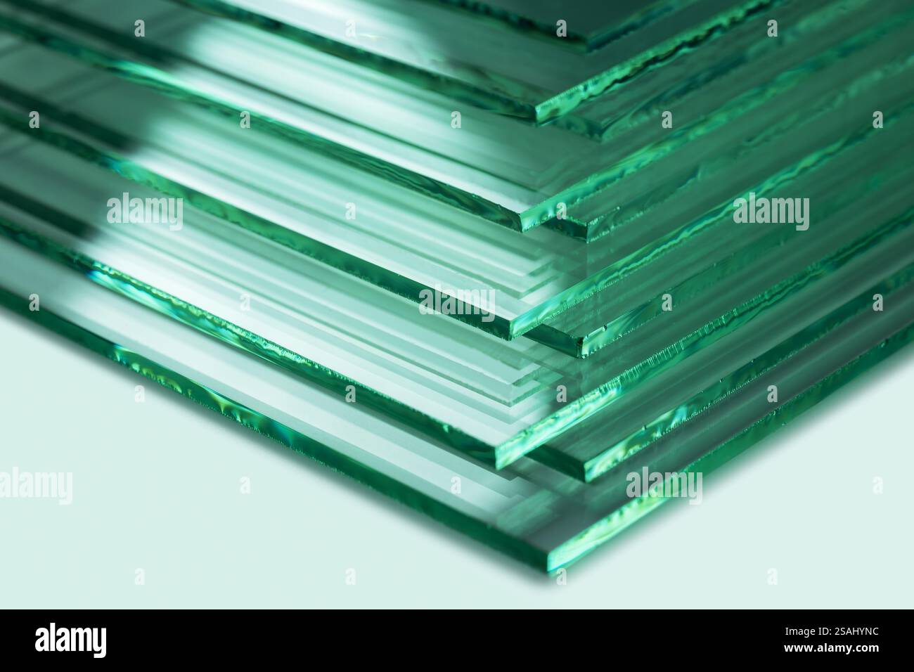 Sheets of Factory manufacturing tempered clear float glass panels cut ...