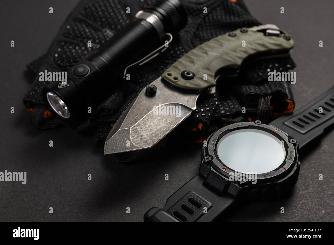 Everyday carry EDC items for men in black color - flashlight, watch and ...
