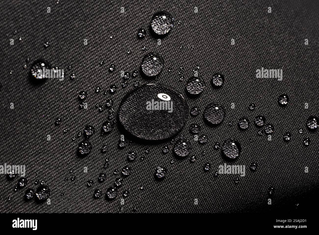 Black fabric, water droplet hi-res stock photography and images - Alamy