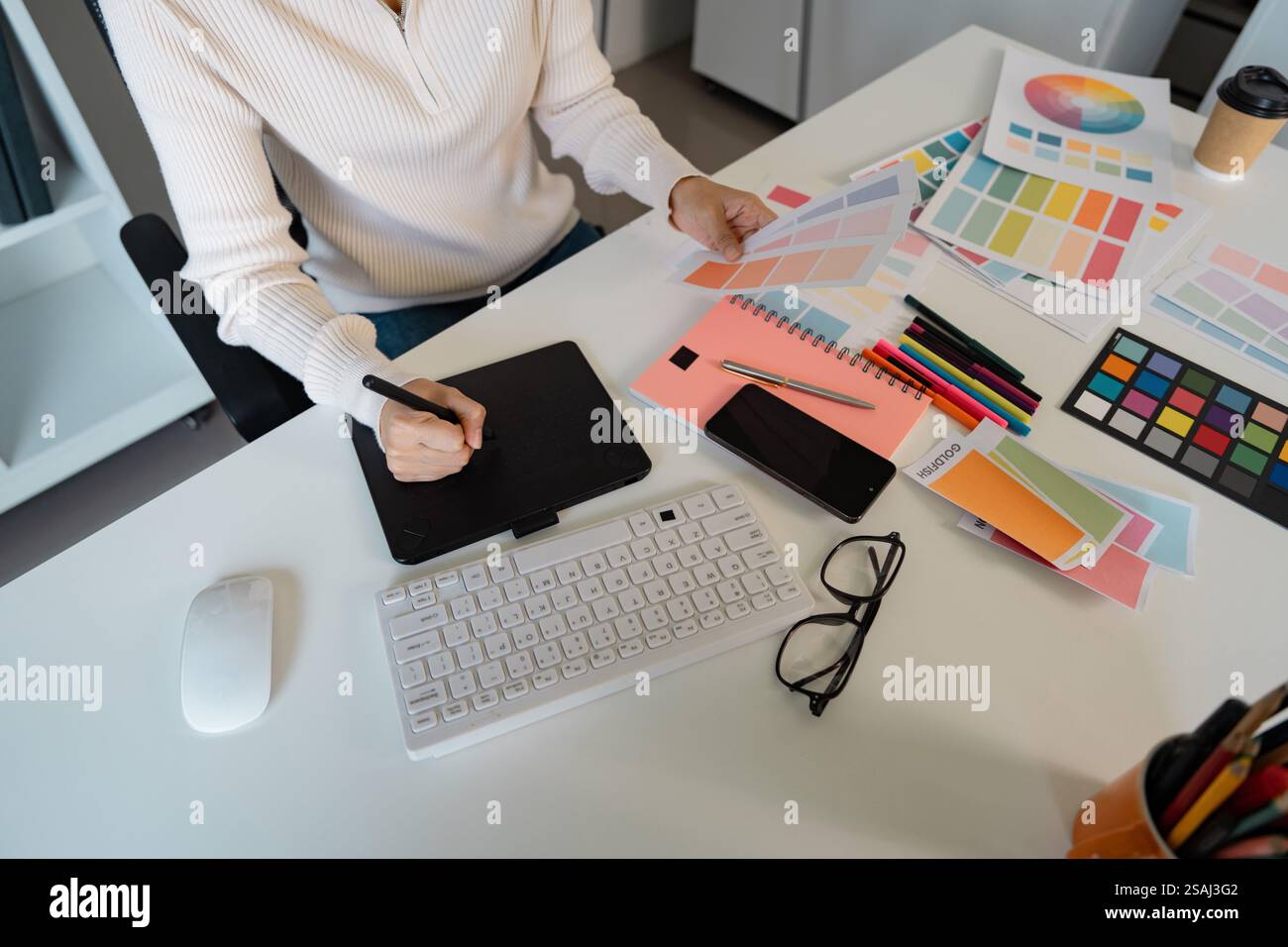 Creative graphic design process with color palettes, sketches, and ...