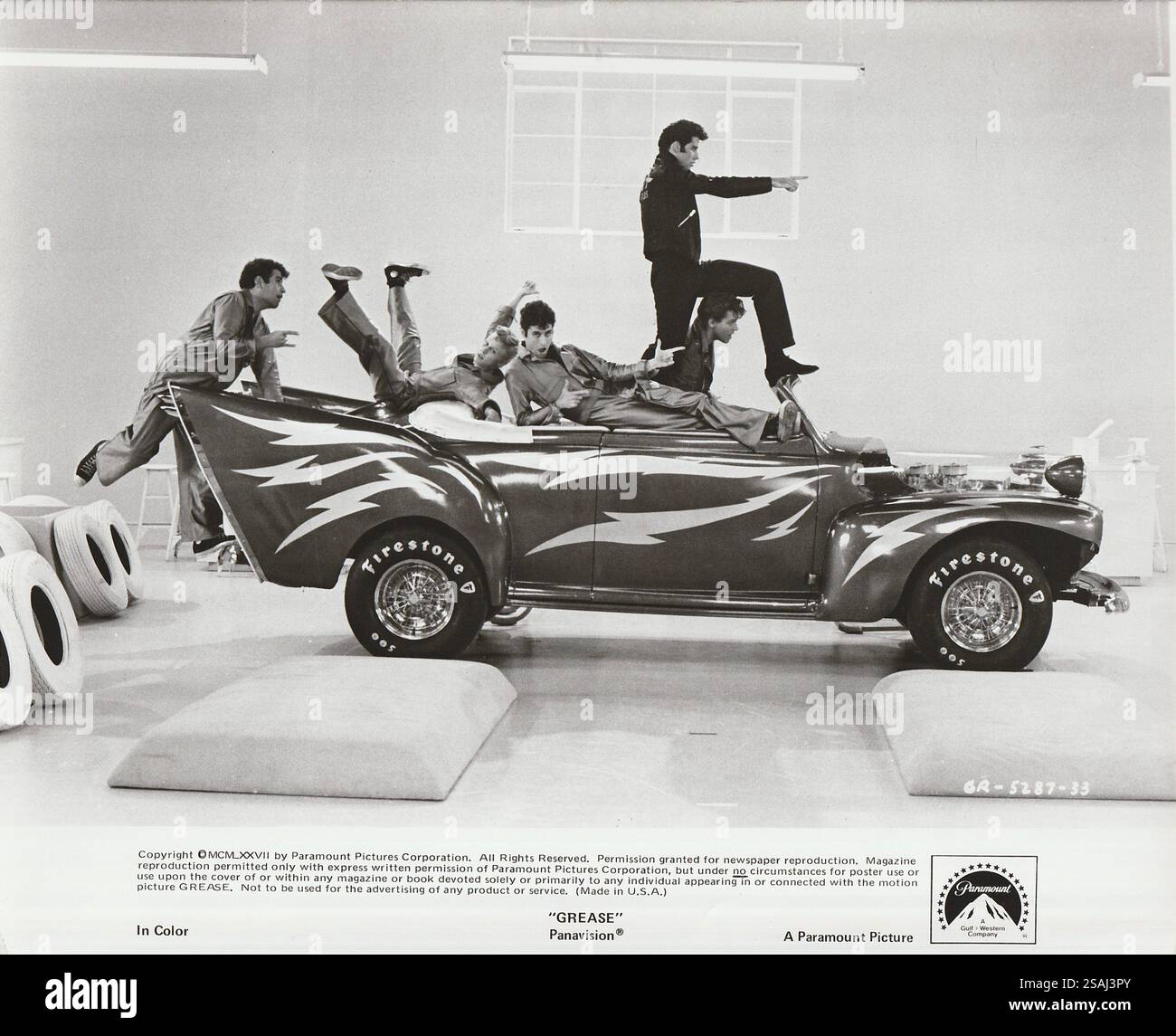 Grease (Paramount, 1978), John Travolta "Danny Zuko" and Olivia Newton-John "Sandy Olsson Stock ...