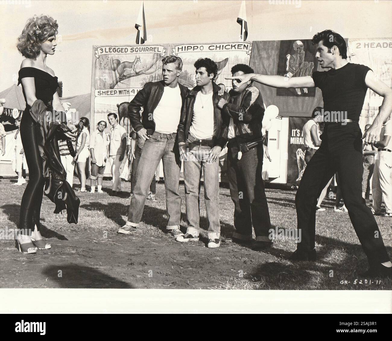 Grease (Paramount, 1978), John Travolta "Danny Zuko" and Olivia Newton ...