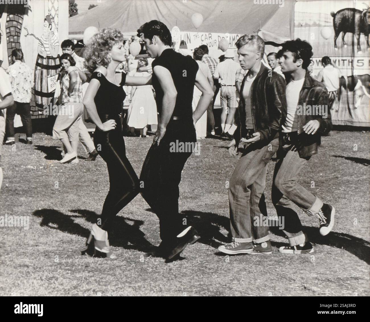 Grease (Paramount, 1978), John Travolta "Danny Zuko" and Olivia Newton ...