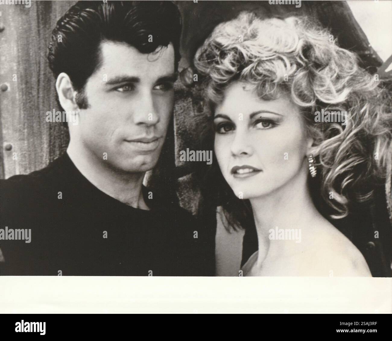 Grease (Paramount, 1978), John Travolta "Danny Zuko" and Olivia Newton ...
