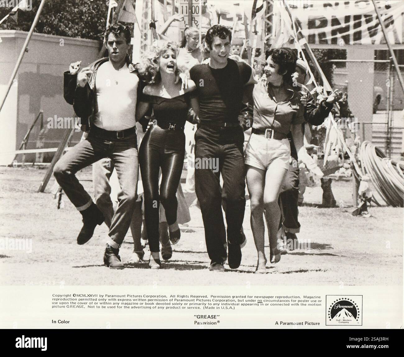 Grease (Paramount, 1978), John Travolta "Danny Zuko" and Olivia Newton ...