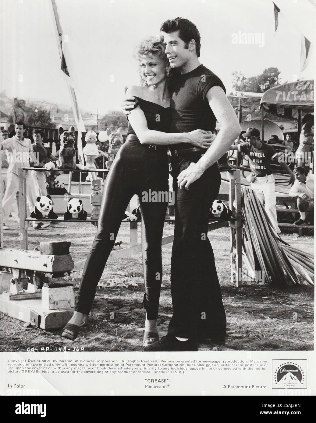 Grease (Paramount, 1978), John Travolta "Danny Zuko" and Olivia Newton ...