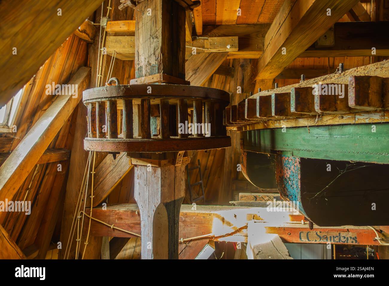 Close-up of the wooden gears and beams inside windmill De Korenbloem in ...