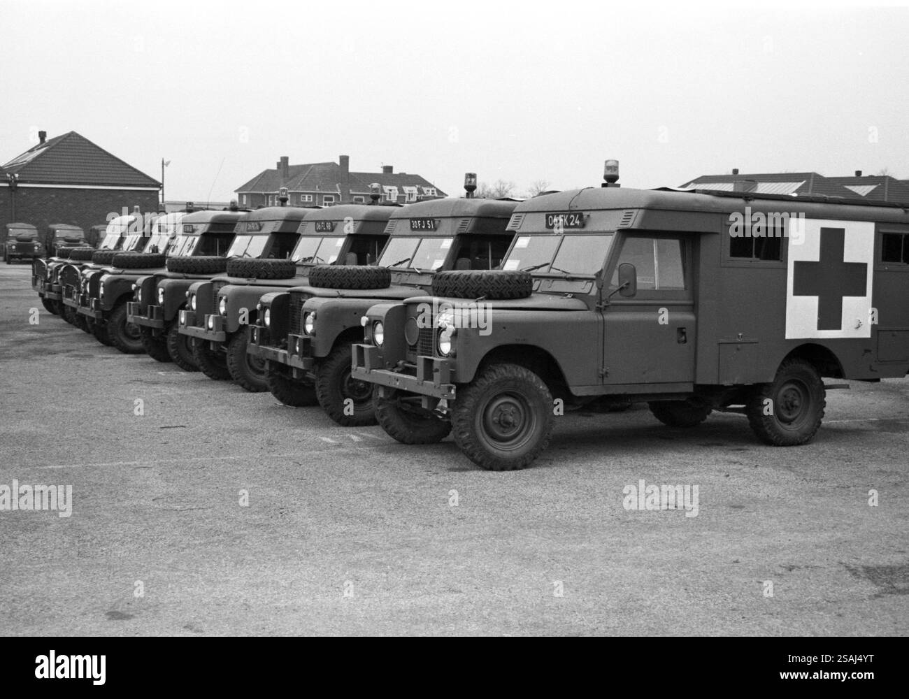 Line of army land rover ambulances at army base on Salisbury Plain 1990 ...