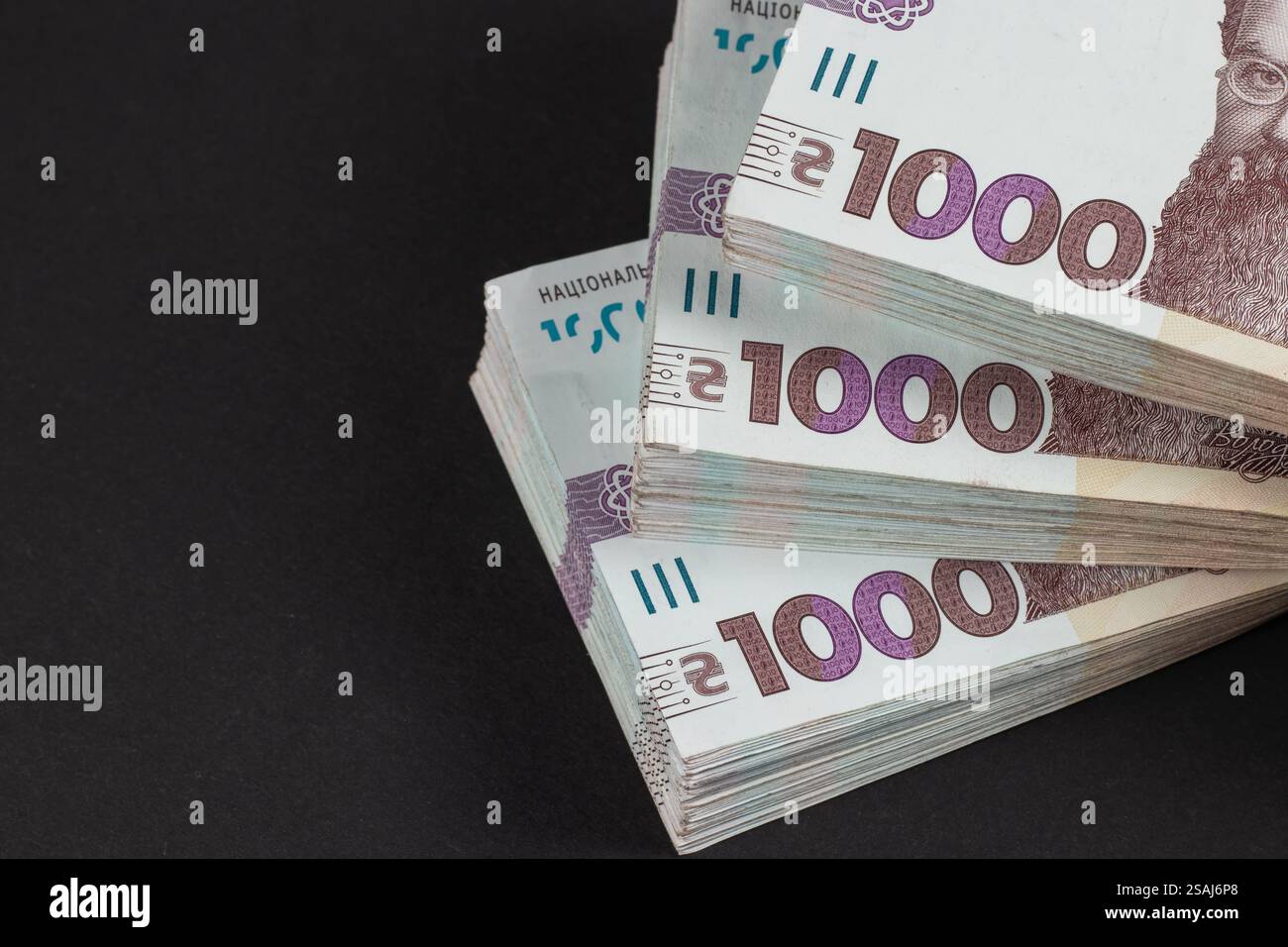 Stack of ukrainian money hryvnia. grivna, hryvna with 1000 banknotes ...