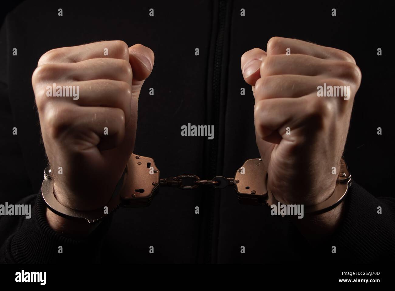 Woman handcuffs behind back hi-res stock photography and images - Alamy