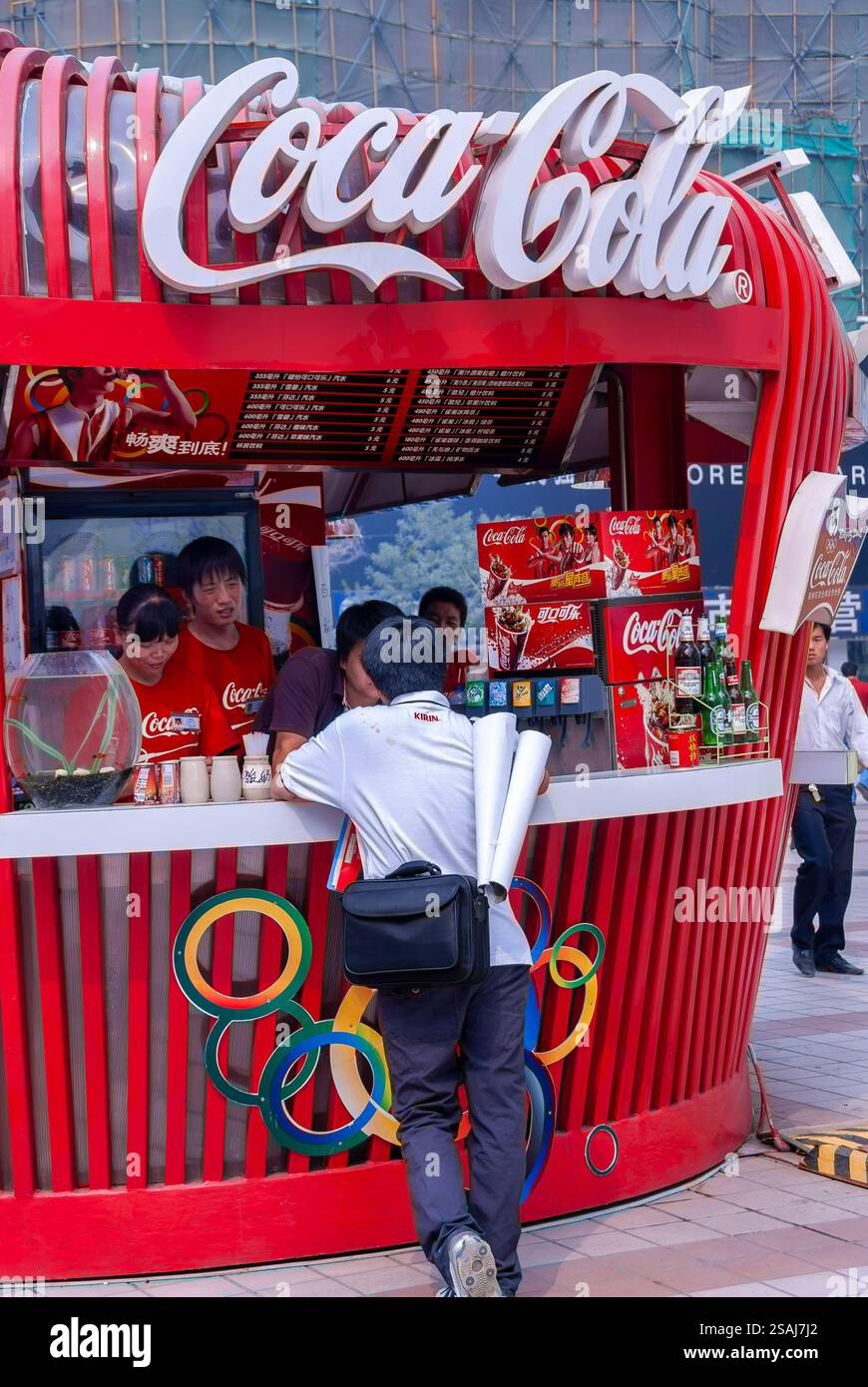 Beijing, CHINA- Chinese Man Drinking Soda, with Advertisement, Exterior ...
