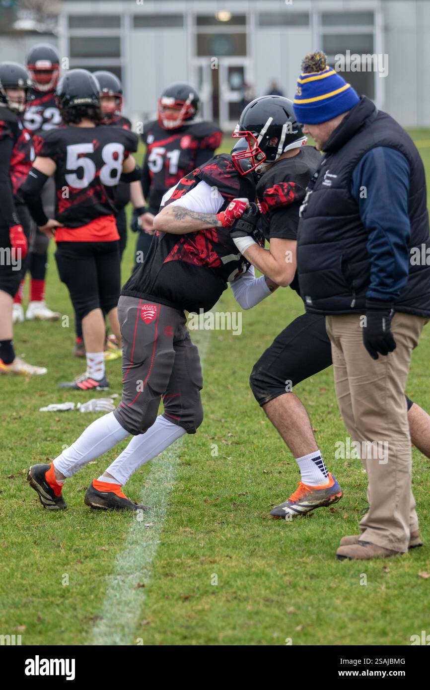 An American football local derby in Norwich between two university ...