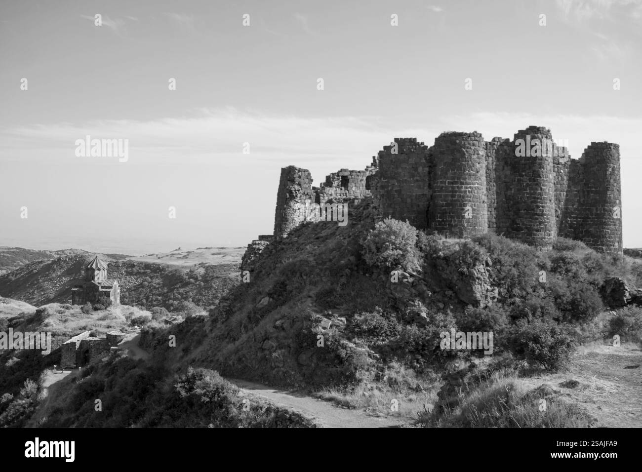 Old castle in nature. Walls of the old castle. Castle towers. Castle on ...
