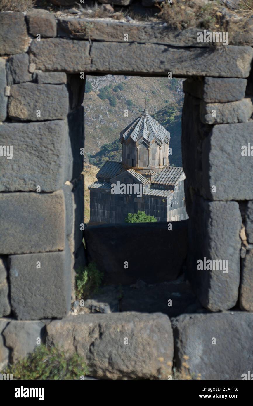 Old castle wall ruins. Caste window and church. Ruins of castle ...