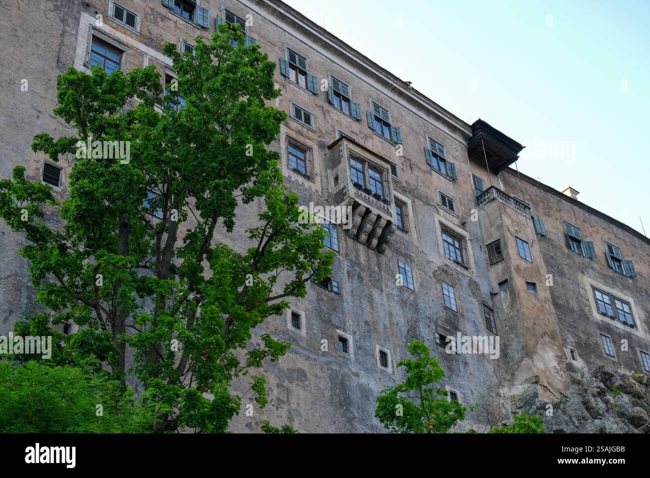 Historic Stone Building with Greenery Stock Photo - Alamy