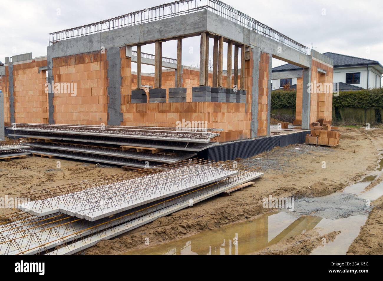 Brick Building Under Construction with Concrete Slabs Stock Photo - Alamy