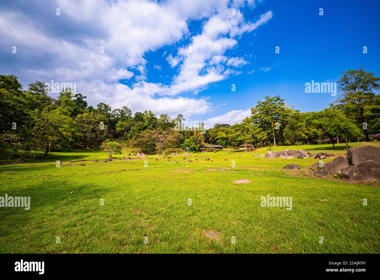 Fang hot spring. A scenic view of a natural hot spring emitting steam ...