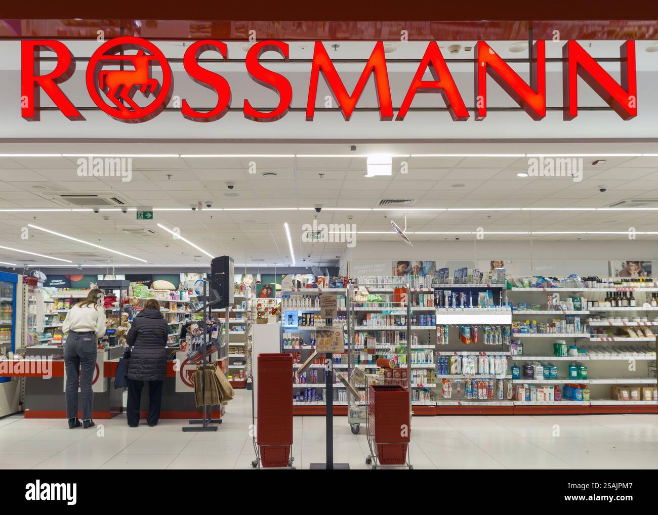 Poznan, Poland. 3 January, 2025: Rossmann store entrance with shoppers ...