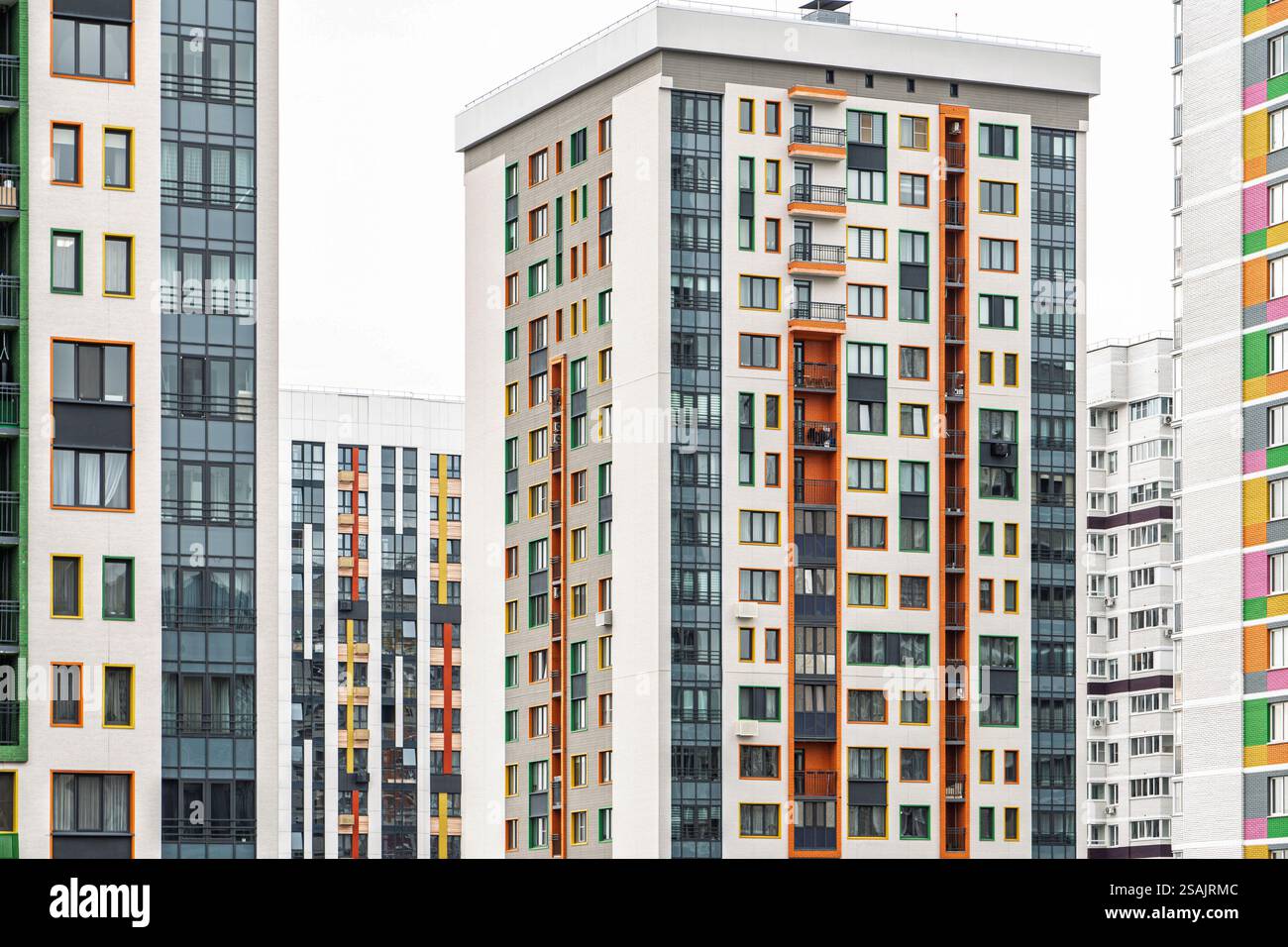 Multi-story apartment buildings with colorful facades and windows ...