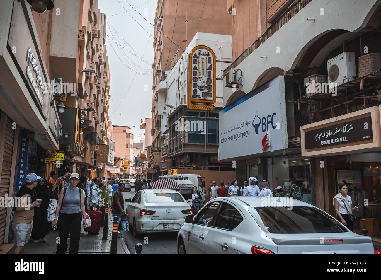 People shopping at Manama Souq traditional arabic market Manama Bahrain ...
