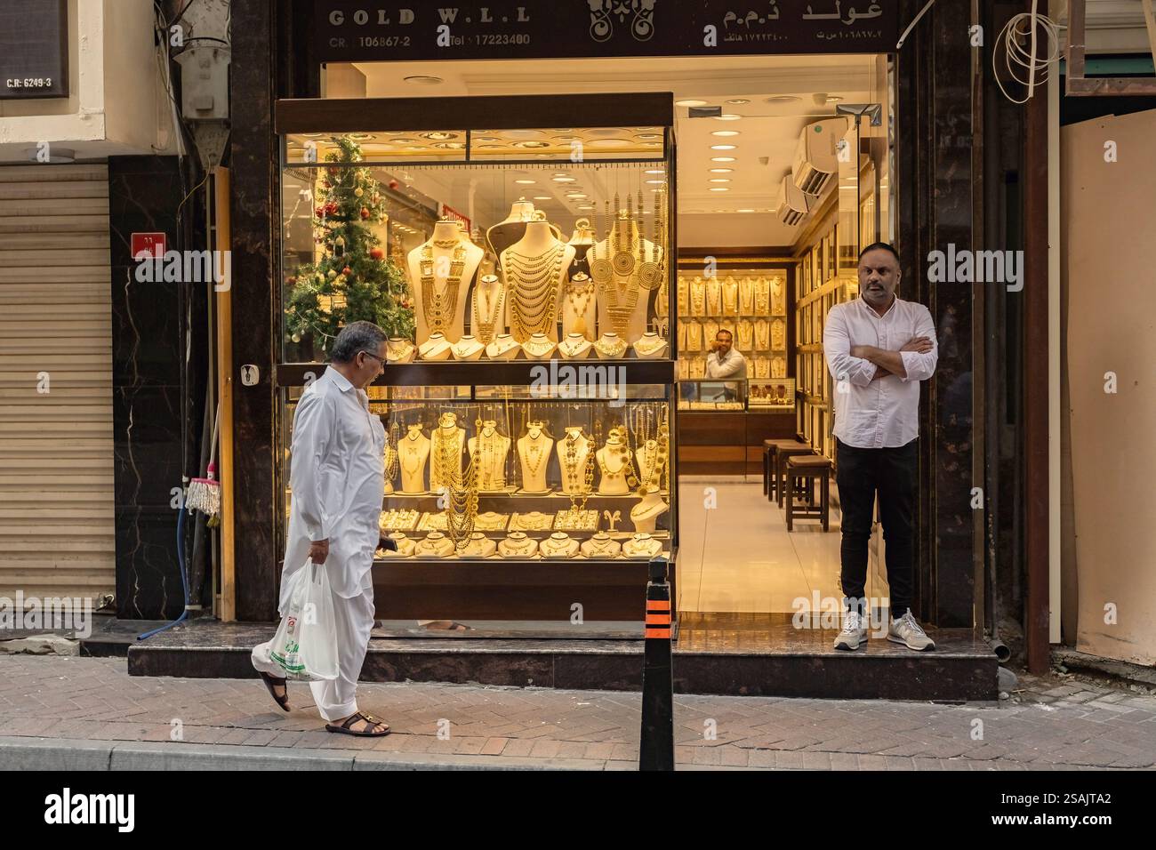 Gold shop on the traditional arabic market Manama Souq in Bahrain Stock ...