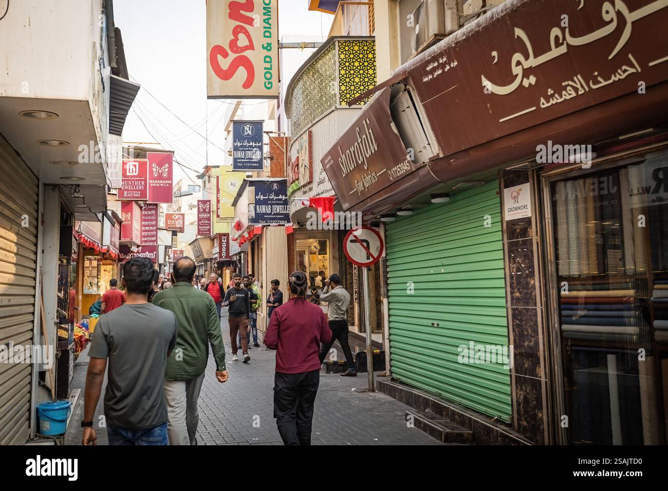 People shopping at Manama Souq traditional arabic market Manama Bahrain ...