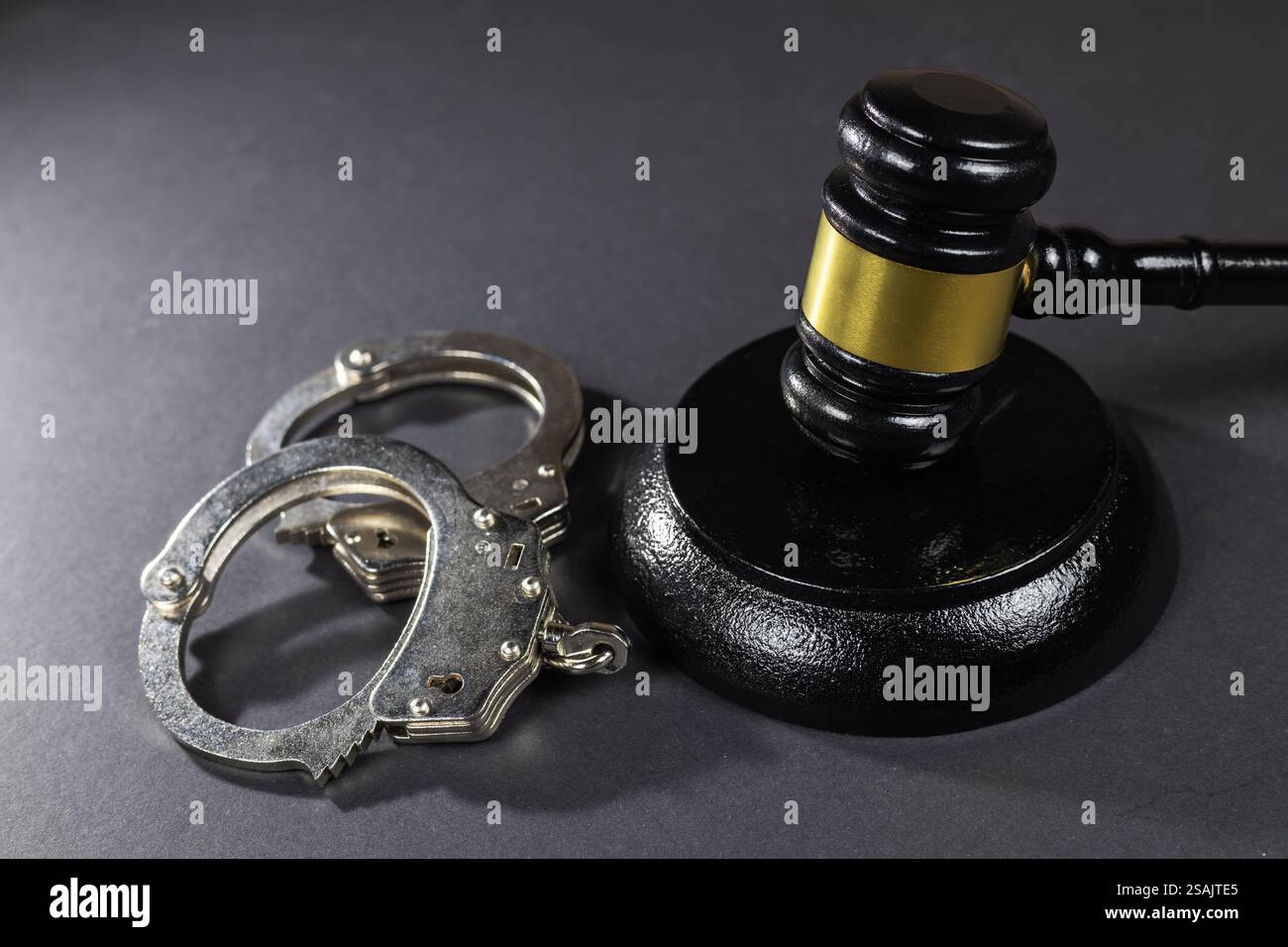Judges gavel handcuffs on hi-res stock photography and images - Alamy
