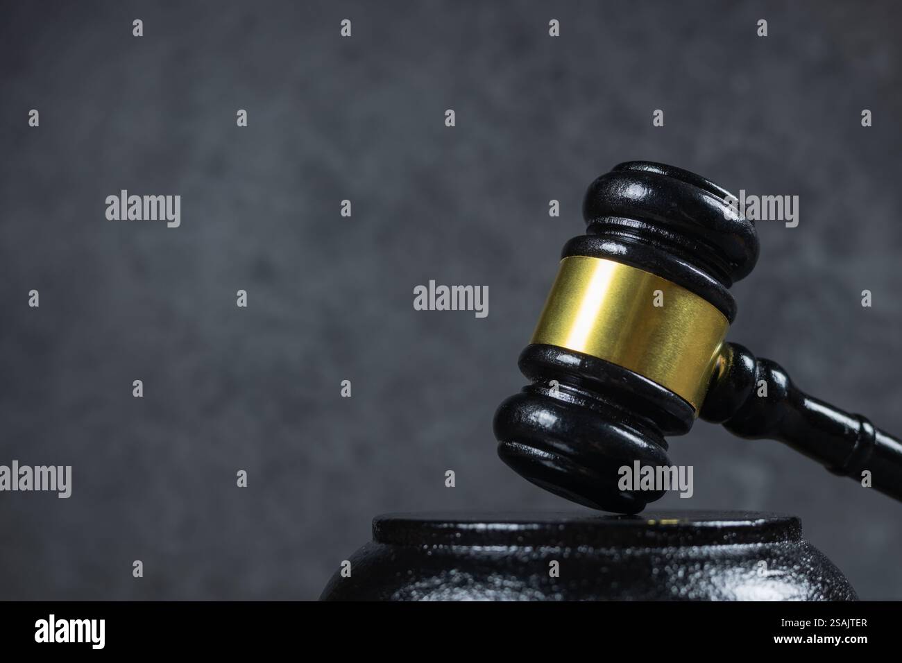 Judge's gavel on dark background. Law theme concept. Mallet of the ...