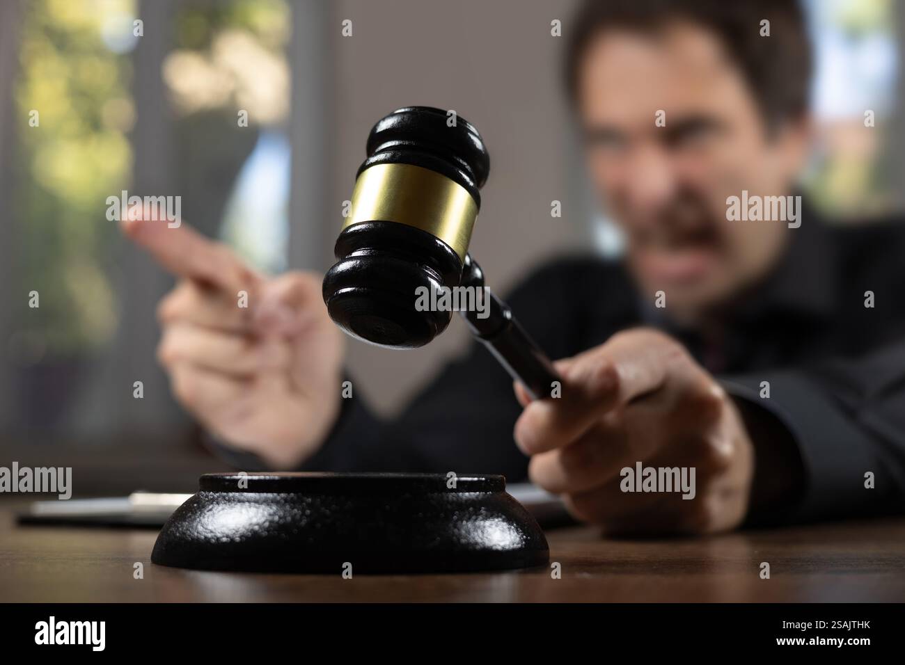 Angry judge banging judge's gavel index finger pointing. Law Lord ...