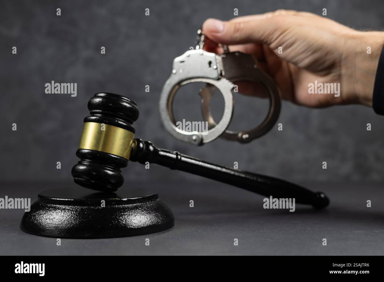 Judges gavel handcuffs in hi-res stock photography and images - Alamy