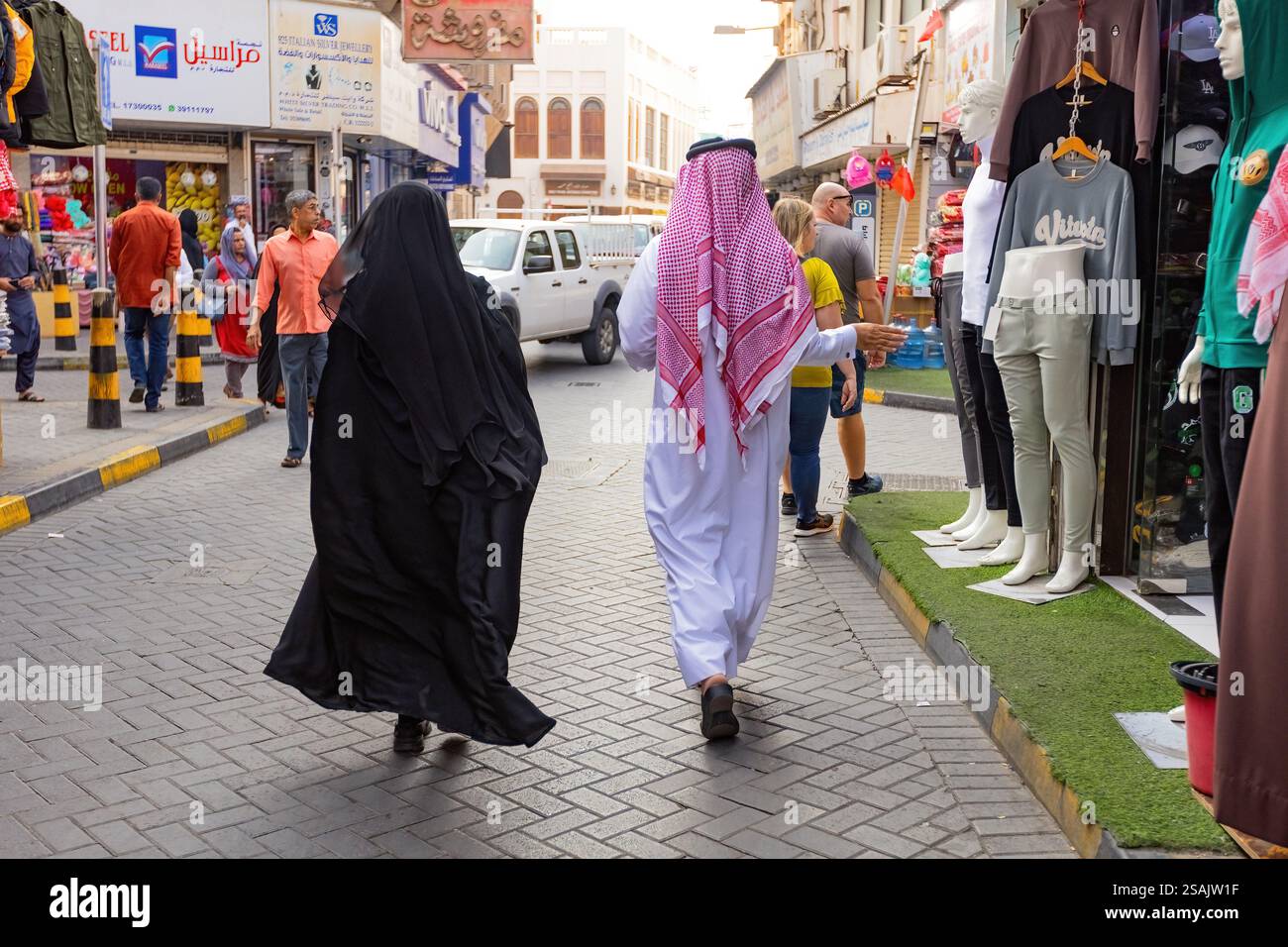 People shopping at Manama Souq traditional arabic market Manama Bahrain ...