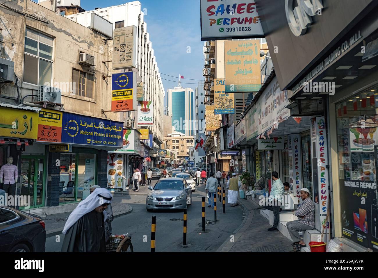 People shopping at Manama Souq traditional arabic market Manama Bahrain ...