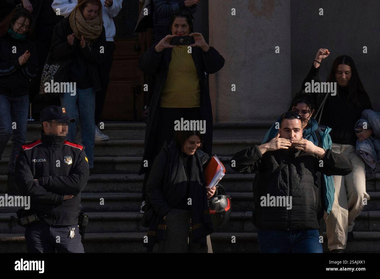 The defendants leave the Barcelona Court during a rally in support of ...