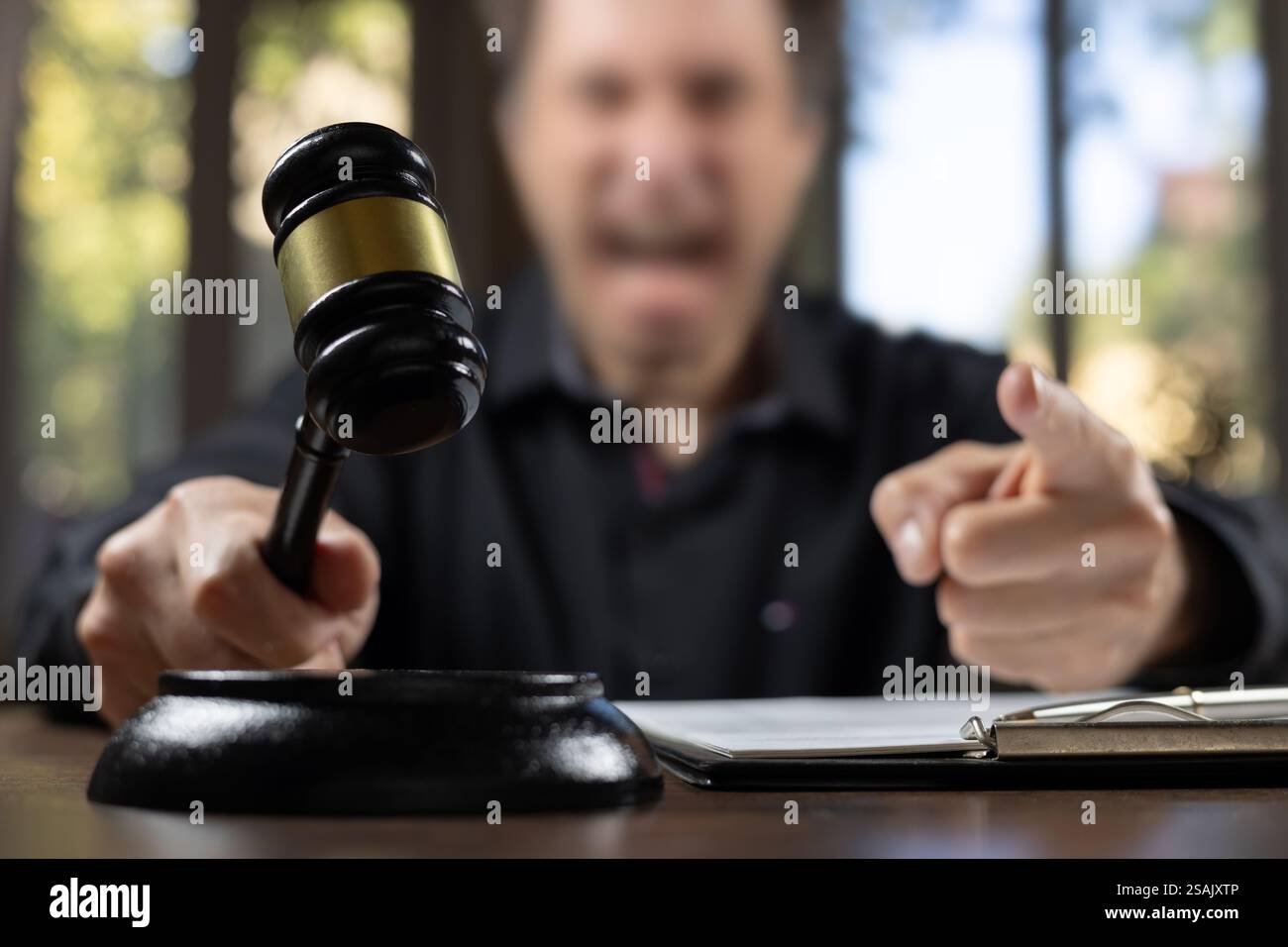 Angry judge banging judge's gavel index finger pointing. Law Lord ...
