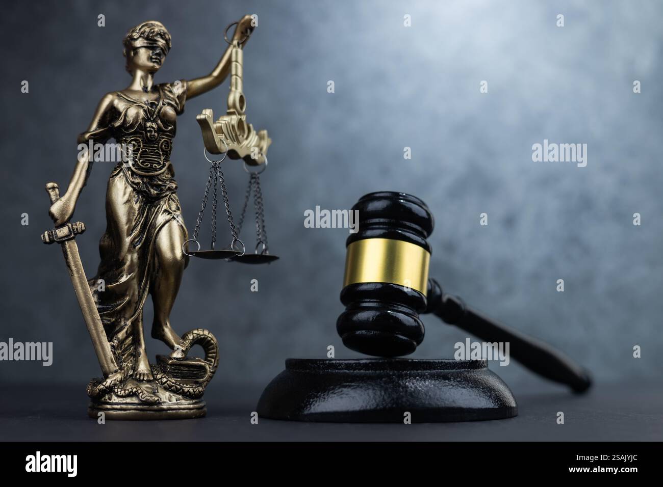 Judge's gavel on Themis statue background. Law theme concept. Mallet of ...