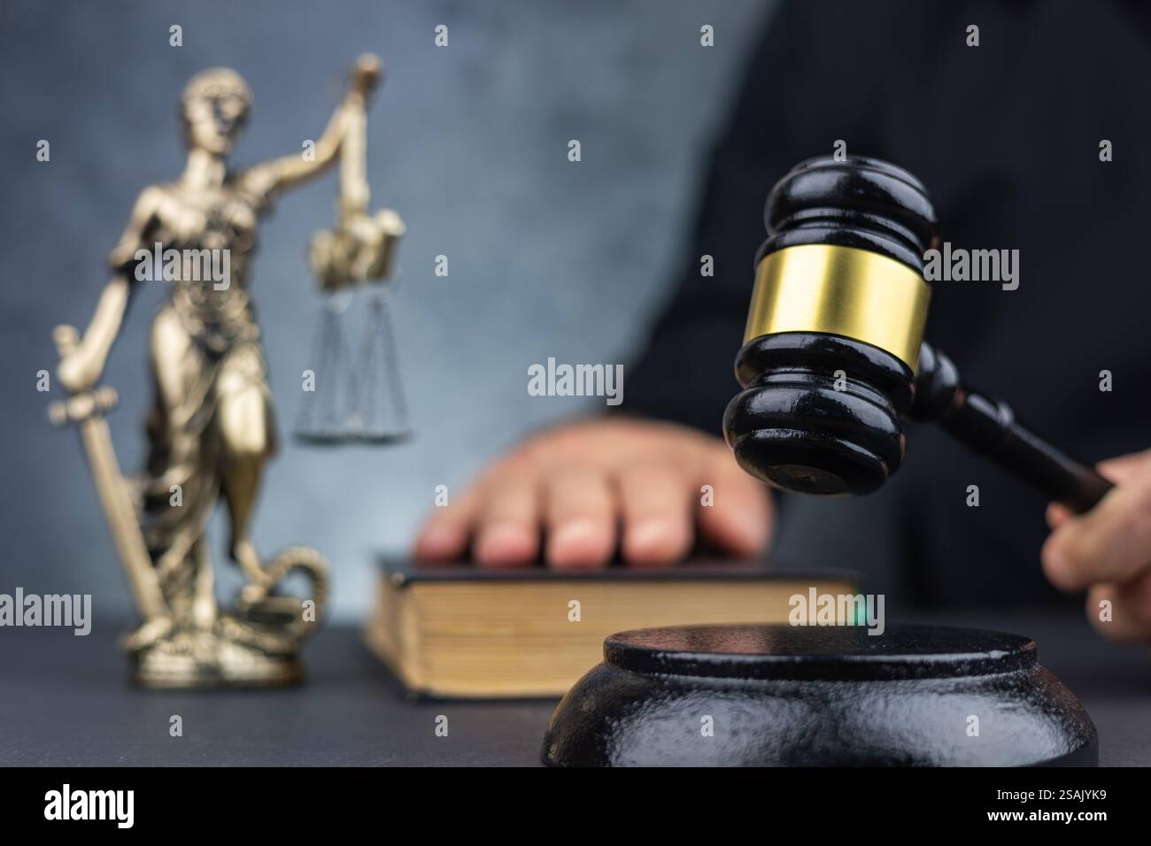 Judge's gavel on Themis statue background. Law theme concept. Mallet of ...