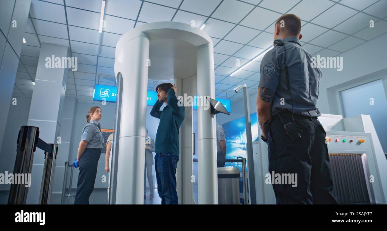 Diverse People Walking Through Metal Detector Scanner in Airport ...
