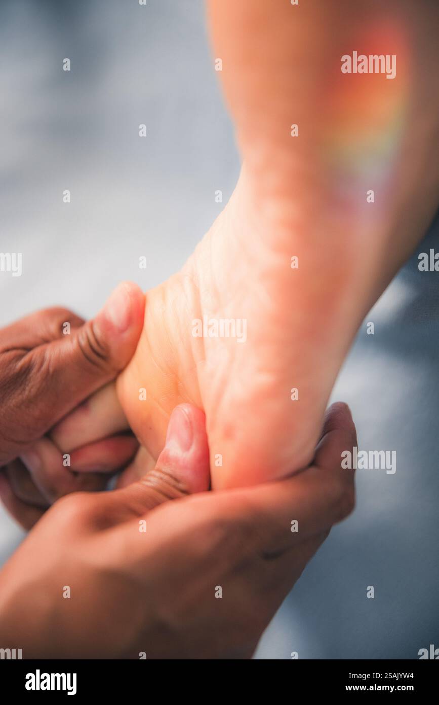Close-up shots of a traditional body massage, focusing on different ...