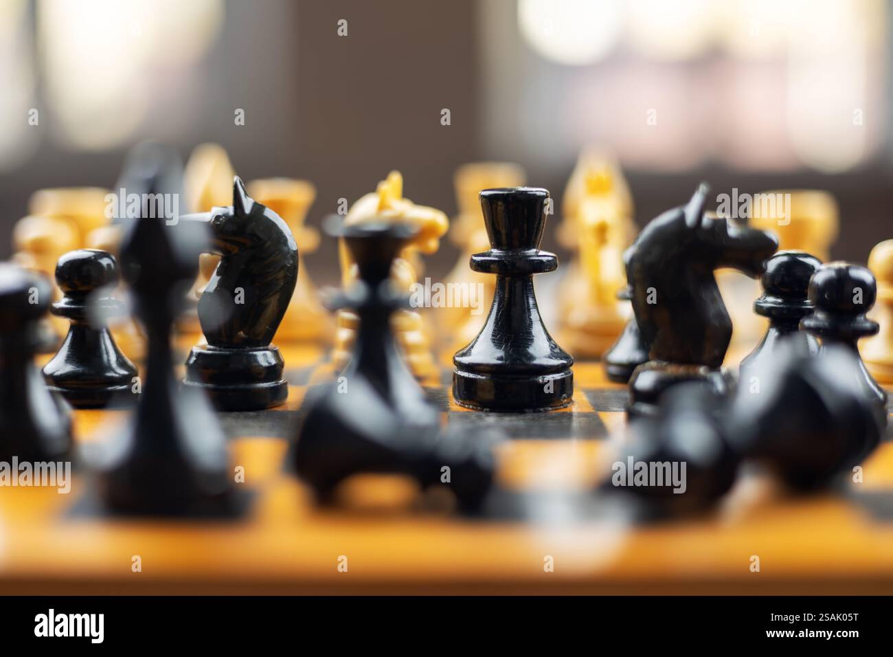 Wooden chess pieces on the chessboard. Intellectual game - chess. Chess ...